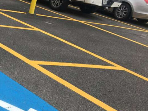 What Do Yellow Stripes in a Parking Lot Mean? | Line Striping